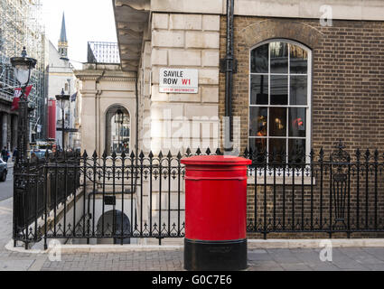 Savile Row W1 City of Westminster street sign hanging on a black ...