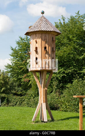 Large dovecote in a public park with tree and river Stock Photo - Alamy