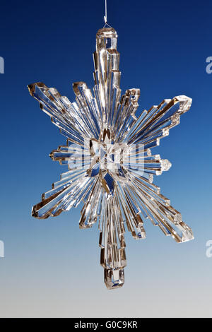Christmas star on ice Stock Photo - Alamy