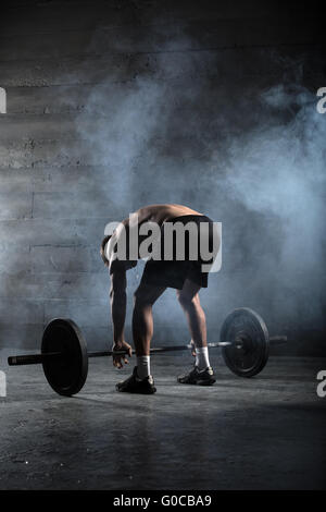 Portrait handsome male athlete with cross country skis in hands and ...
