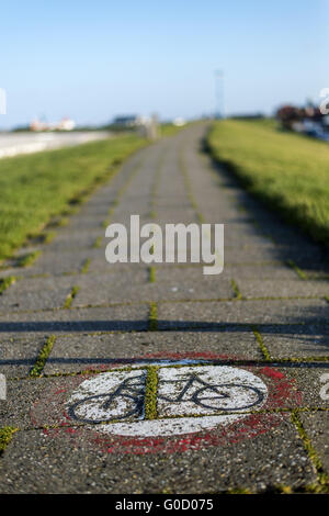 Prohibition sign for cyclists on the dyke crest Stock Photo - Alamy
