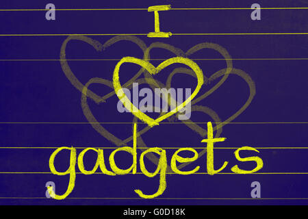 I Love gadgets phrase handwritten on blackboard Stock Photo - Alamy