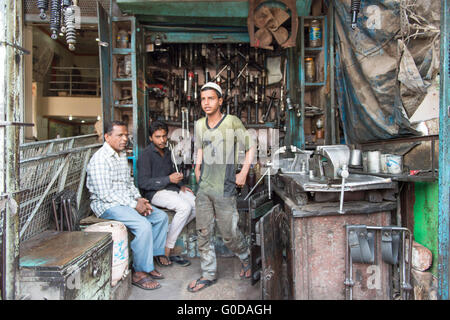 Local Indian mechanic pose for camera the street of Old Delhi in India ...