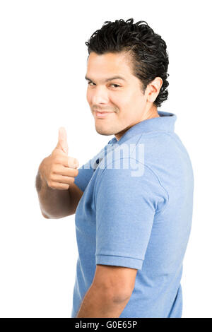 Hispanic man standing over blue background puffing cheeks with funny ...