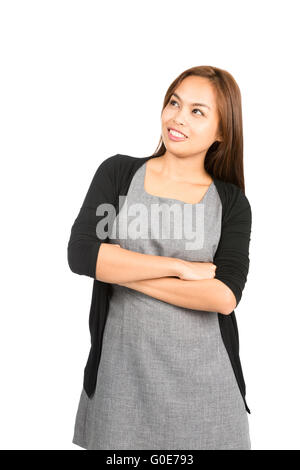 Happy woman looking away while standing on city street Stock Photo - Alamy