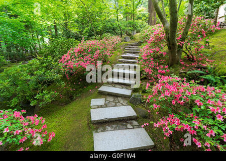 Granite stone stair steps at Japanese Garden in lush green landscape ...