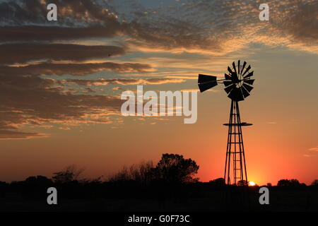 Kansas Golden Orange Sunset with a Windmill Silhouette,tree's,clouds ...