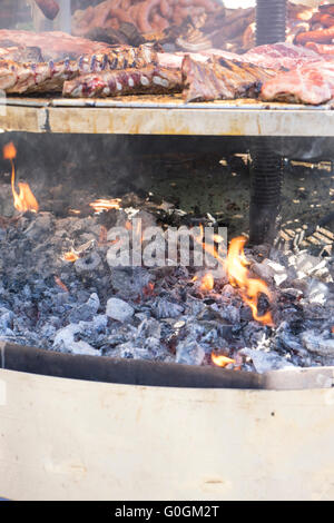 medieval barbecue with sausages, octopus, meat, ribs and all kinds of ...