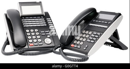 Two office digital multi-button telephone sets with LCD isolated on ...