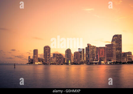 Miami at sunset. Miami Florida, colorful skyline of Macarthur causeway ...