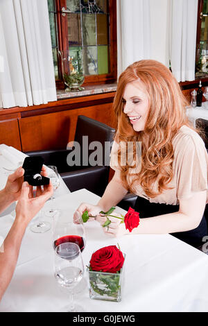 romantic evening date in restaurant happy young couple with wine glass ...