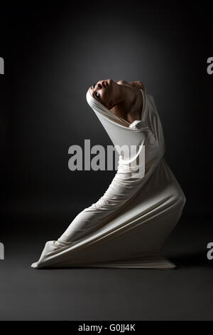 Madness concept. Emotional girl in strange pose Stock Photo - Alamy
