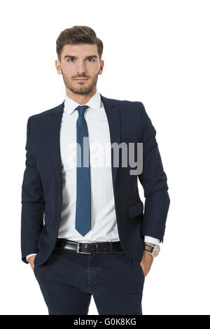 Portrait of young attractive company executive sitting at table with ...