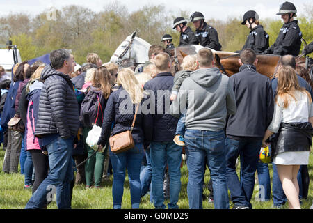 Mounted police demonstrating the use of a crowd control training ball ...