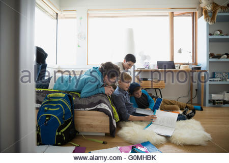 boy in his bedroom doing his homework Stock Photo - Alamy