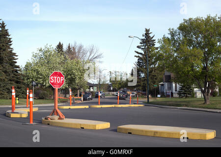 Traffic calming curbs in city street Stock Photo - Alamy