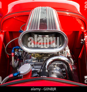 Close up of the chrome air intake of a red V8 hot rod in New Zealand ...