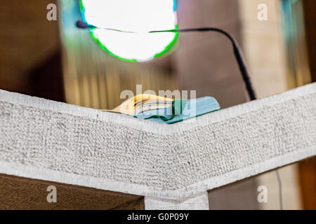holy book on concrete lectern Stock Photo - Alamy