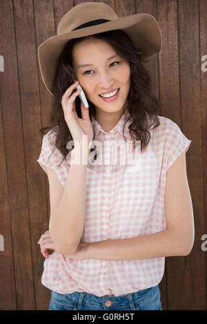 Businesswoman calling for someone Stock Photo - Alamy