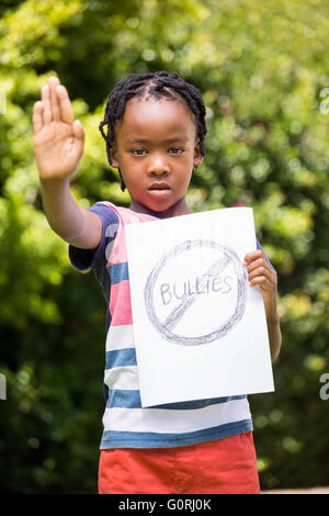 Hand holding stop sign Stock Photo - Alamy