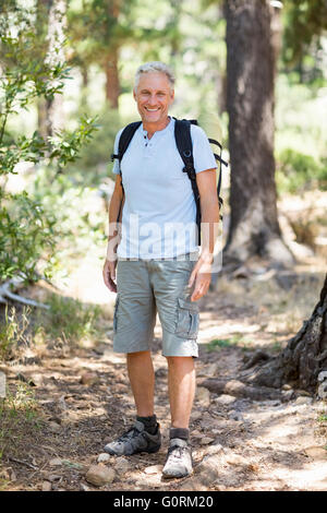 Hiker smiling and posing Stock Photo - Alamy