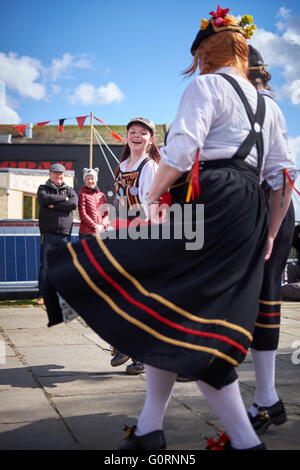 Feet of a morris dancing troop showing clogs and flowing dresses on a ...