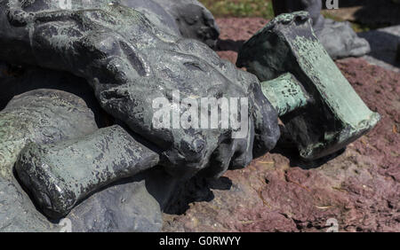 Bronze statue with a hammer, detail of a statue of a worker Stock Photo ...
