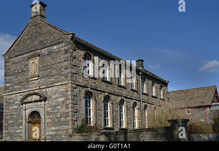 Sedbergh Public School Library, showing crest over doorway in the gable ...