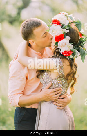 Man wearing flower wreath Stock Photo - Alamy