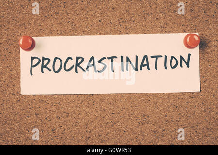 Concept of procrastination with the now or later Stock Photo - Alamy