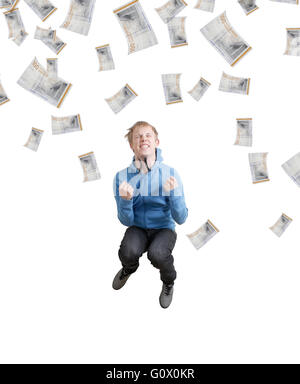 Happy jumping man with money on color background Stock Photo - Alamy