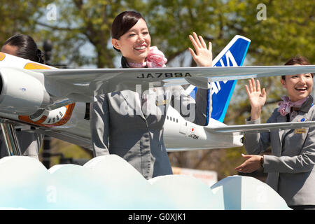 ANA Airlines flight attendant on a parade float - USA Stock Photo - Alamy
