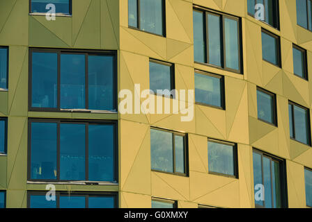 Residential high-rise buildings with irregular shaped and sized windows ...