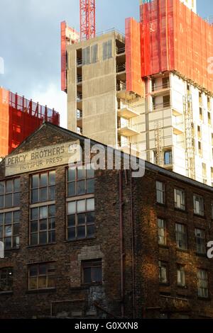 Old mill, Percy Brothers Ltd, in the centre of Manchester against a ...