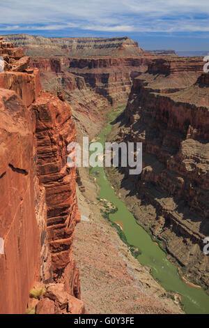 Grand Canyon landscape with vast cliffs and deep valleys under a clear ...