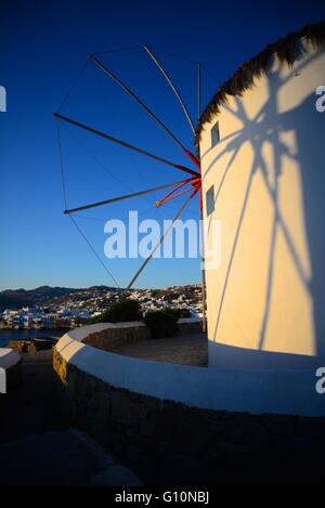 Traditional windmills (Kato Milli) at sunset in Mykonos town, Greece ...