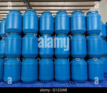 blue plastic barrels Stock Photo - Alamy