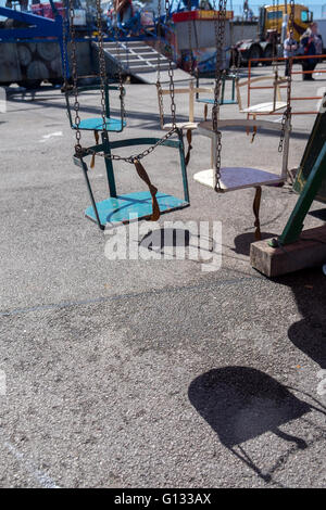 Old fashioned fairground swings ride, deserted Stock Photo - Alamy