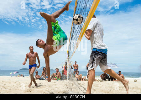 Sports futevolei or footvolley in Brazil This is the beach volleyball ...