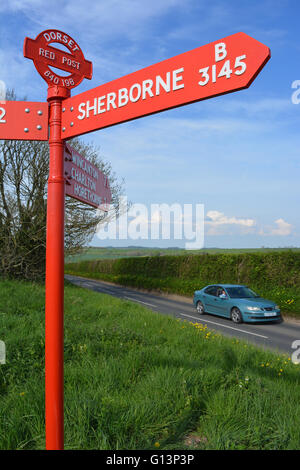 Dorset, Red Post. A restored red finger signpost located on the B3145 ...