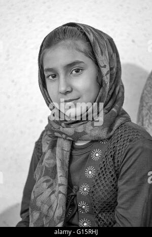 Fatima Sadat, Iranian girl, age 12, wearing a hijab in her rural home ...