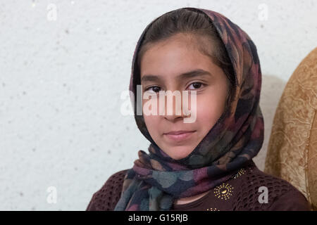 Fatima Sadat, Iranian girl, age 12, wearing a hijab in her rural home ...