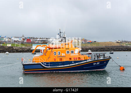 RNLI Lifeboat in Portrush Harbour. In background, Portrush Yacht Club ...