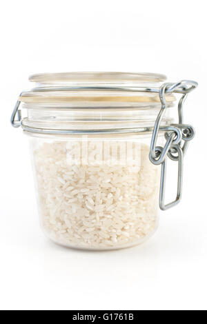 Raw rice in a jar isolated on white Stock Photo - Alamy