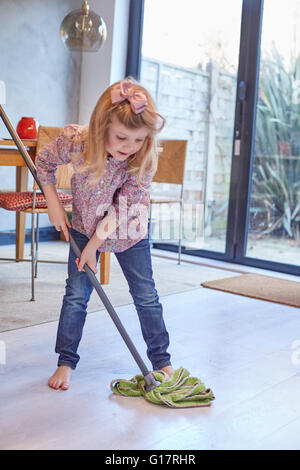 Child Mopping Floor Stock Photo - Alamy
