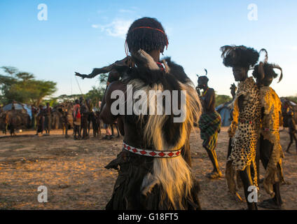 Dassanech men and women during dimi ceremony to celebrate circumcision ...