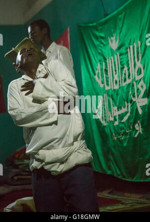 Sufi people go into a trance during a ceremony, Harari region, Harar ...