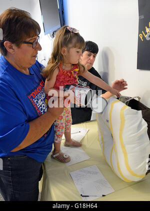 Albuquerque, NM, USA. 10th May, 2016. Dana Oliveri, Preparator for the ...