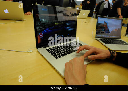 Customers at the Apple Mac store at St. David's Dewi Sant shopping mall ...