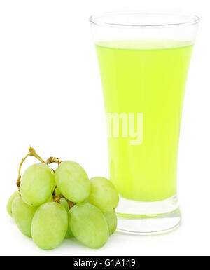 Sweet Green grape branch over background Stock Photo - Alamy